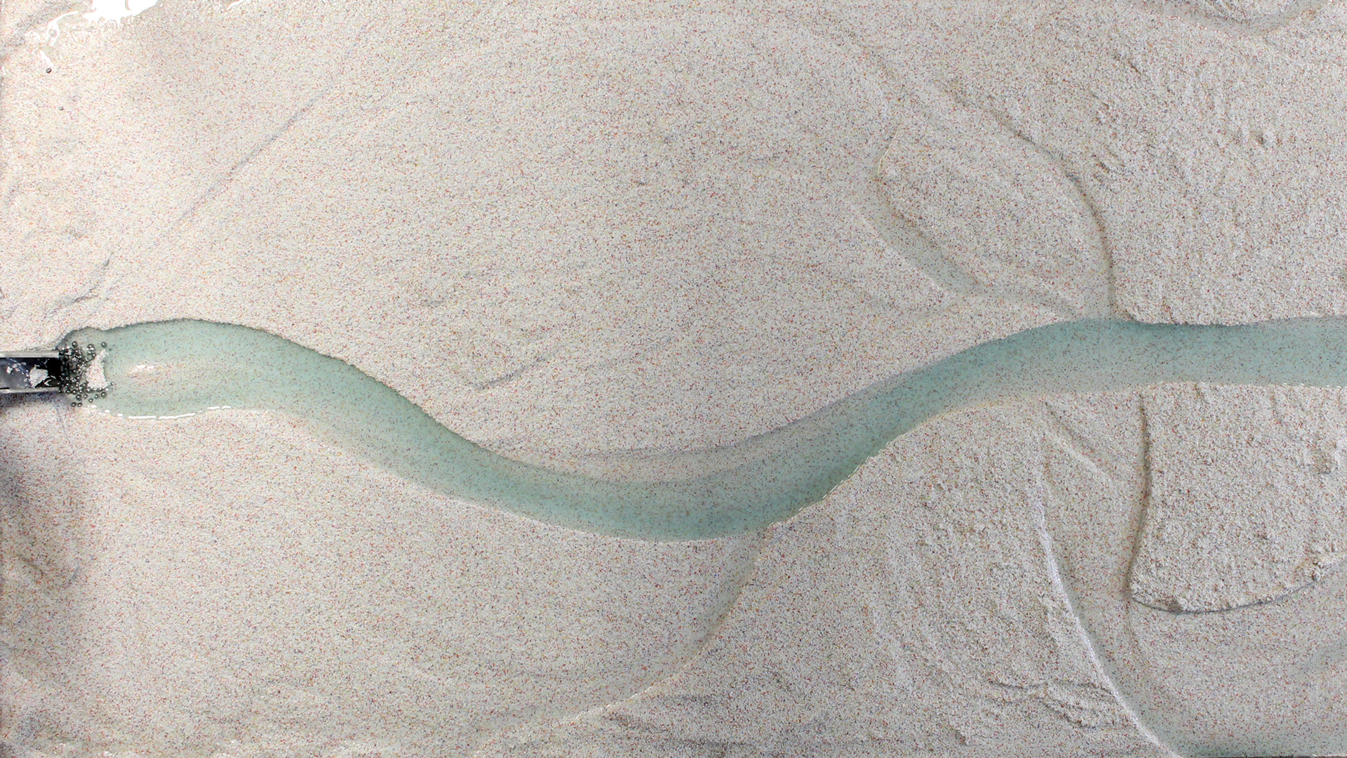 The shape of rivers determined by the sediments they carry - Institut ...